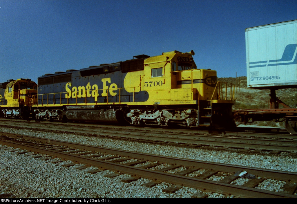 Santa Fe 5700 former bi-centennial unit now sporting freight warbonnet colors